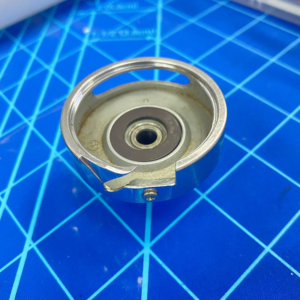 XC4141121 OUTER ROTARY HOOK ASSY — Ban Soon Sewing Machine Pte Ltd